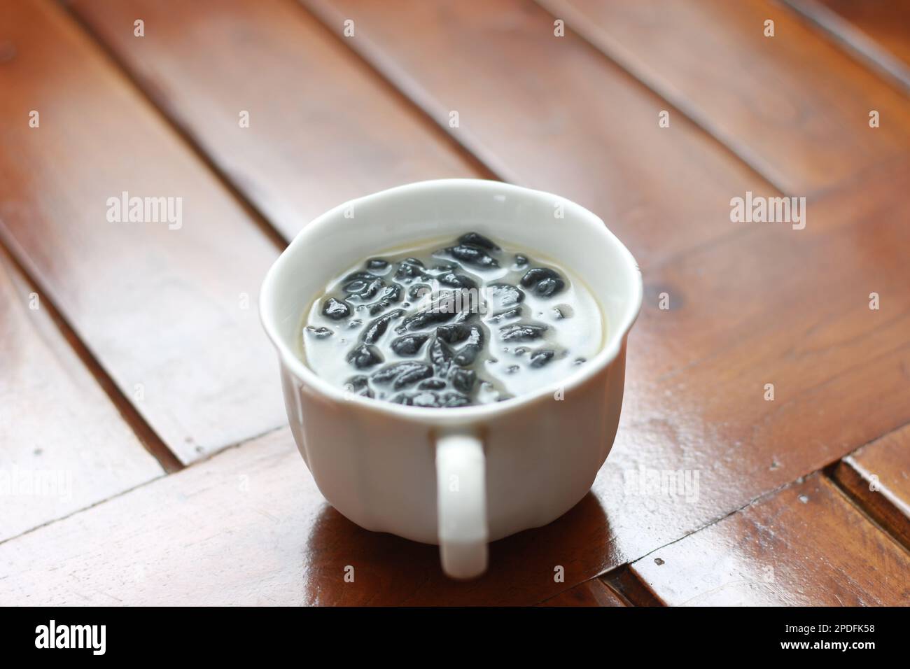 a close up of a glass of a traditional Indonesian drink called Dawet ...