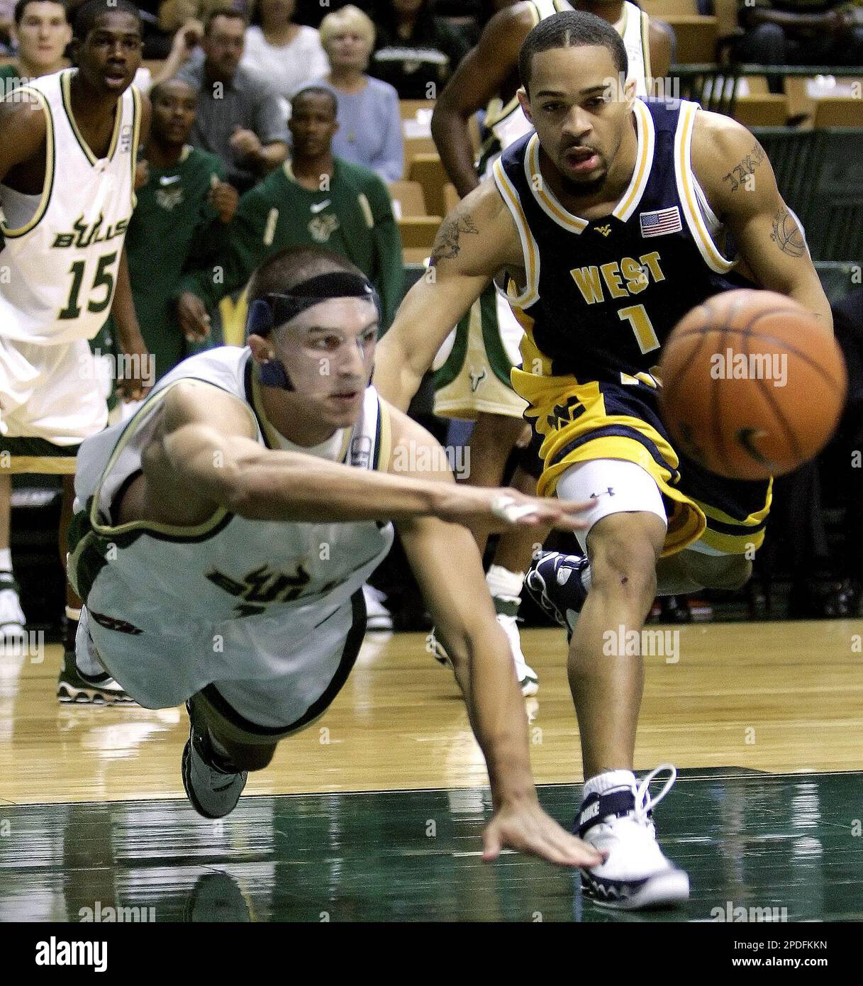 South Florida guard Chris Capko, left, knocks the ball away from West ...