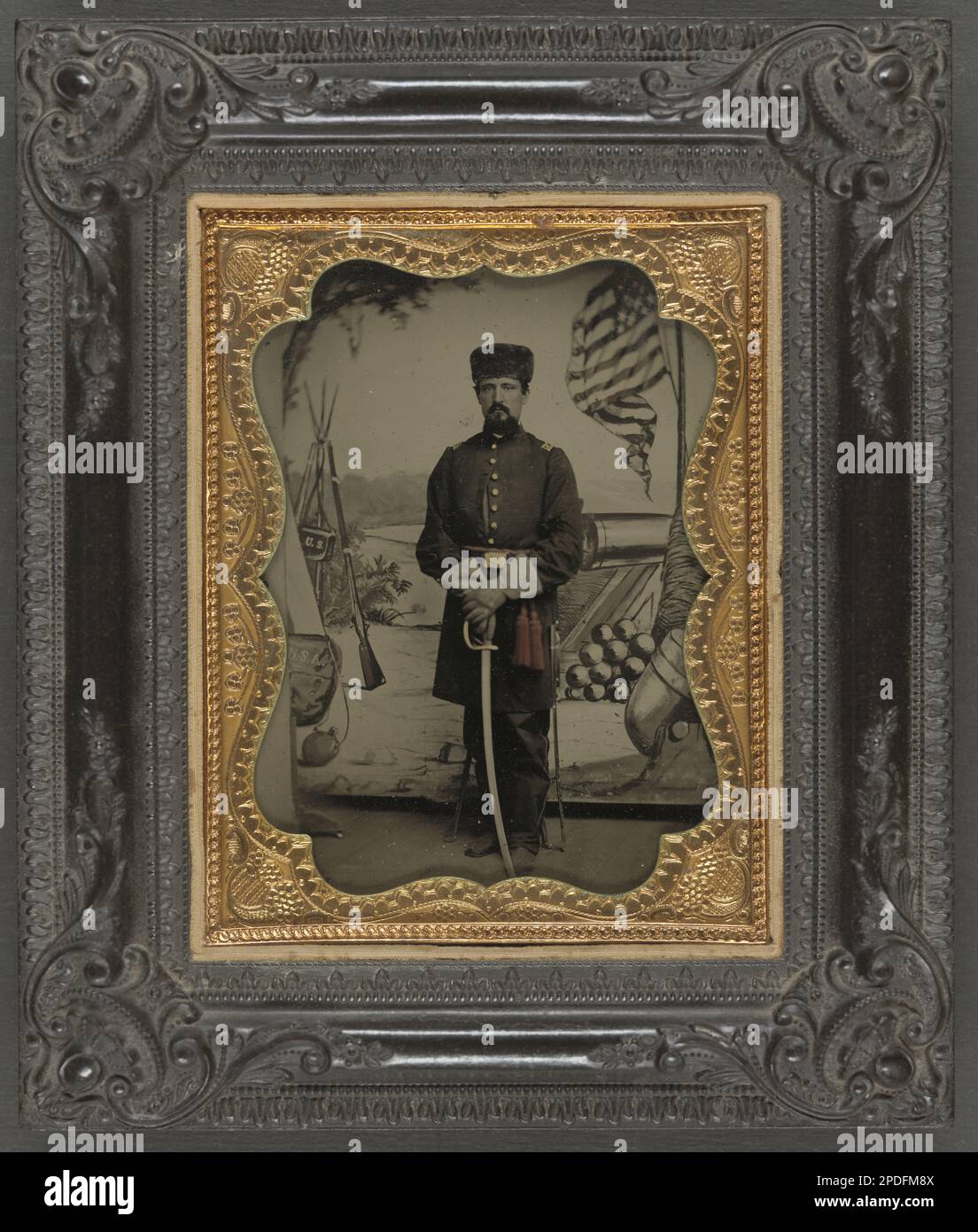 Unidentified soldier in Union uniform with sword in front of painted ...