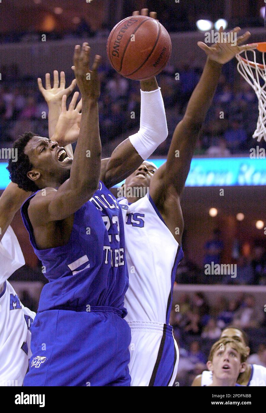 Middle Tennessee's Marcus Morrison, left, drives to the basket against ...