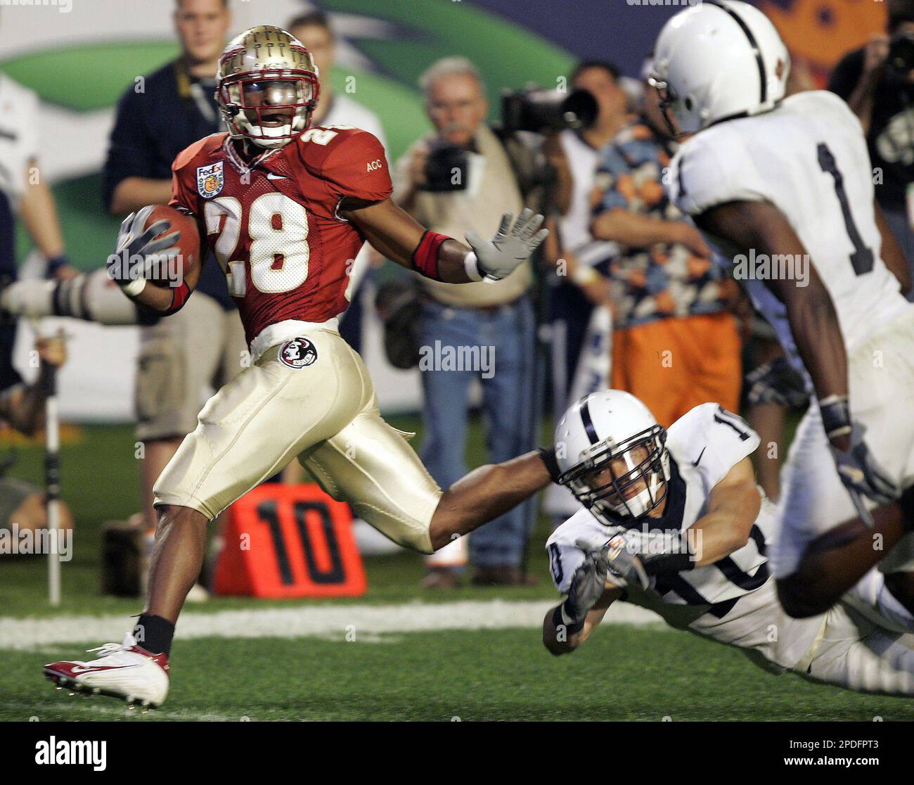 Florida State's Lorenzo Booker (280 outruns Penn States Calvin Lowry ...