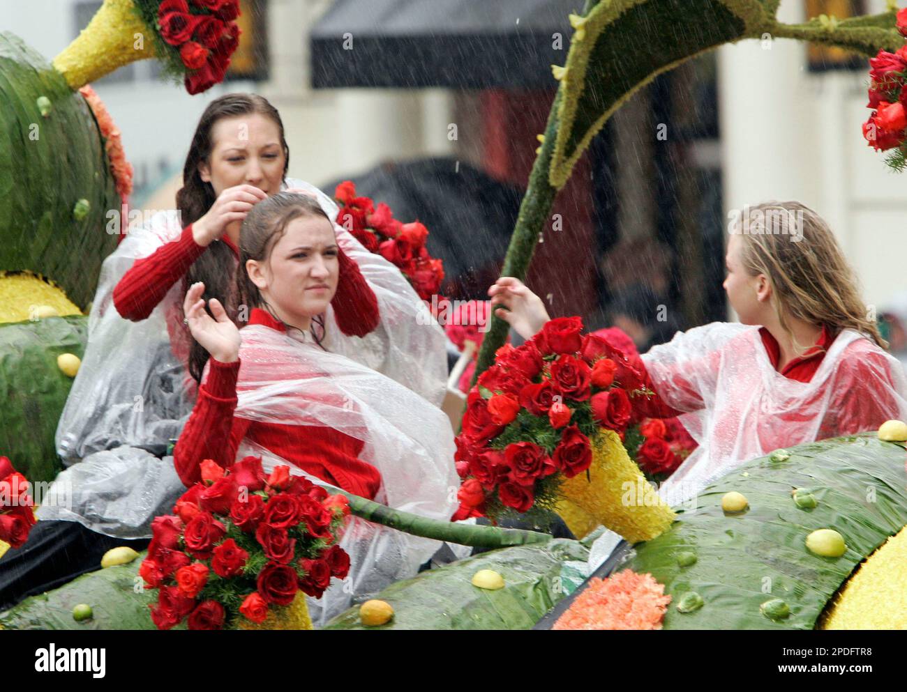 Unidentified girls adjust their wet hair on top of the "Wonder of ...