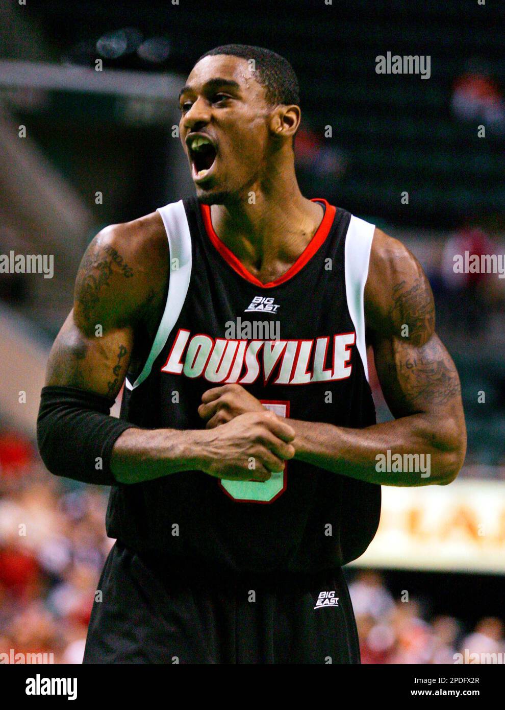 Louisville's Taquan Dean (5) reacts to a play during the first half of ...