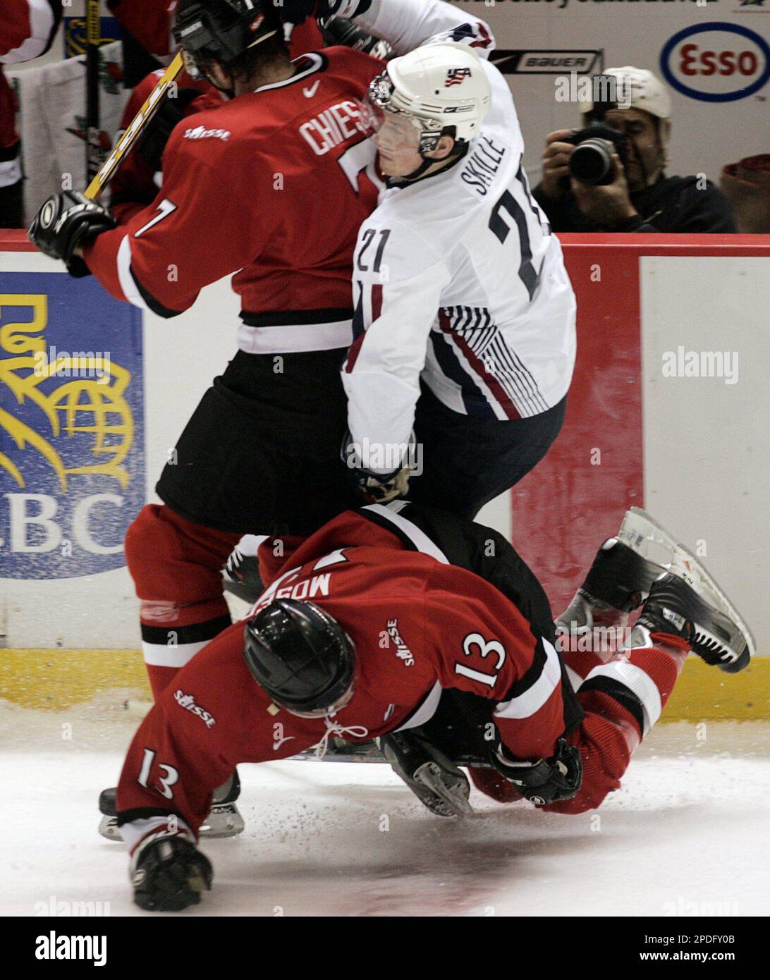 Team USA's Jack Skille collides with Team Switzerland's Stephan Moser ...
