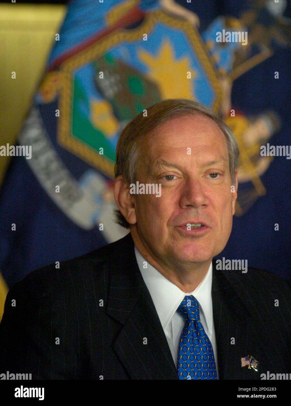 New York Gov. George Pataki speaks with reporters at the Capitol in ...