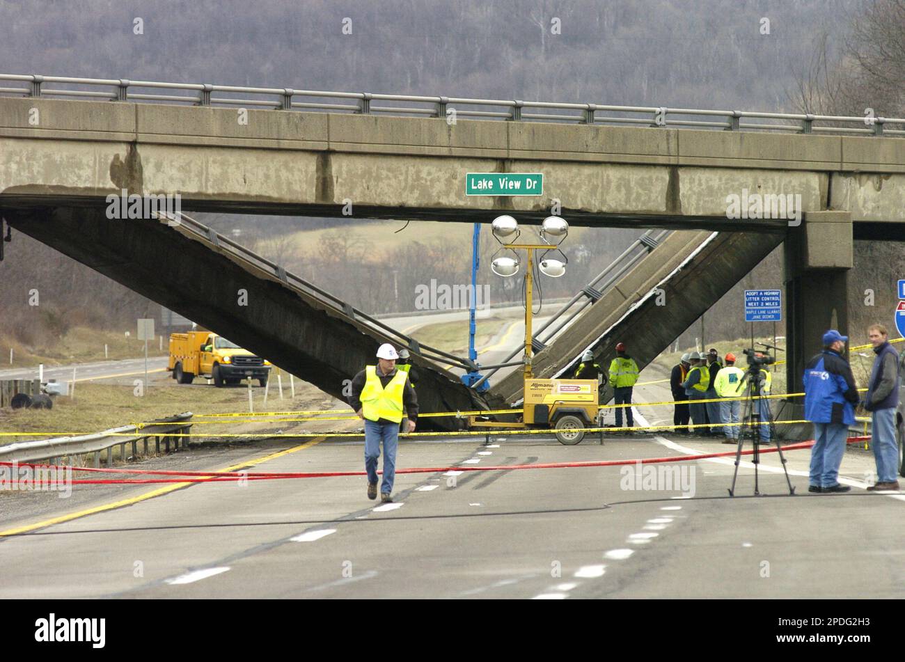 Crews investigate the damage Wednesday morning, Dec. 28, 2005, after a ...