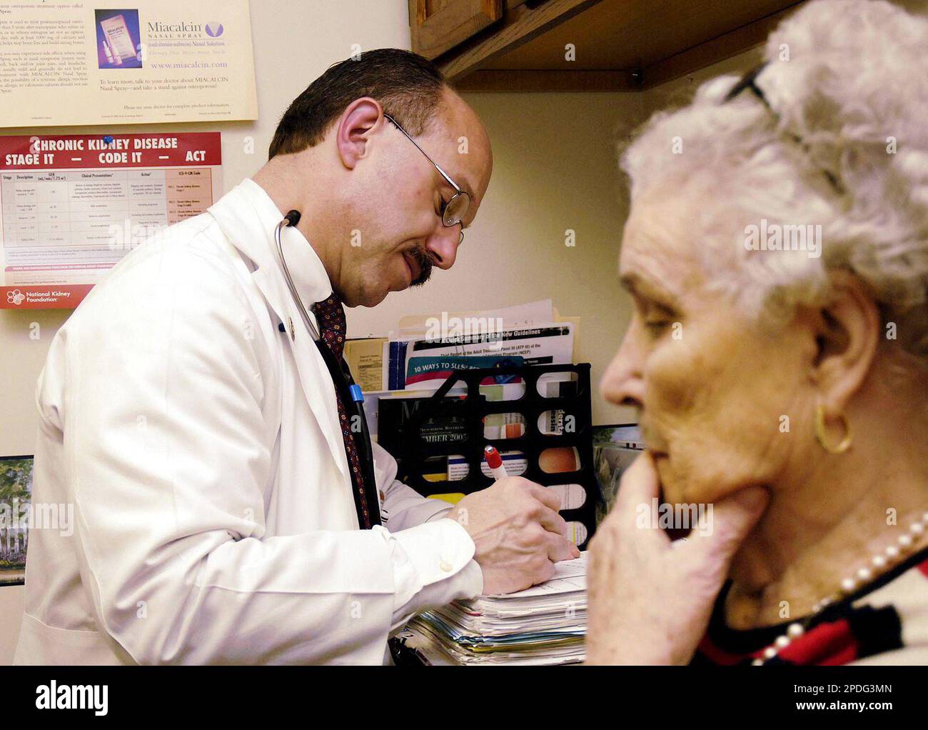 Dr. Joe Vetrano, left, an internist at the Clearfield Professional ...