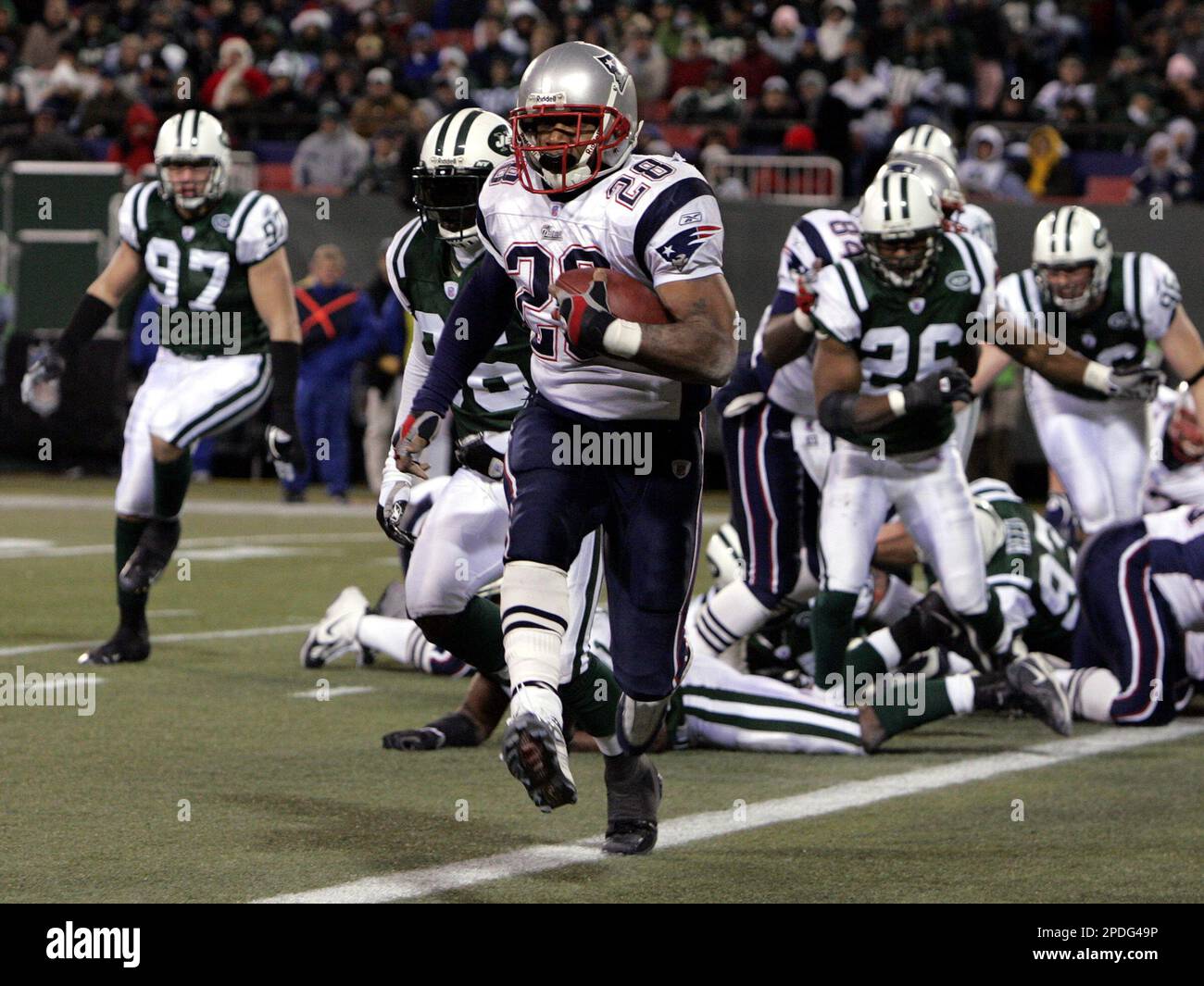 New England Patriots' Corey Dillon (28)crosses the goal line for a ...