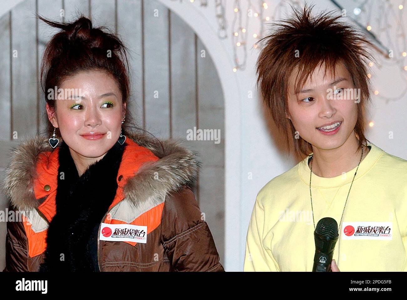 Mainland Chinese singers Angela Au, left, and Li Yu-chun, both winners ...