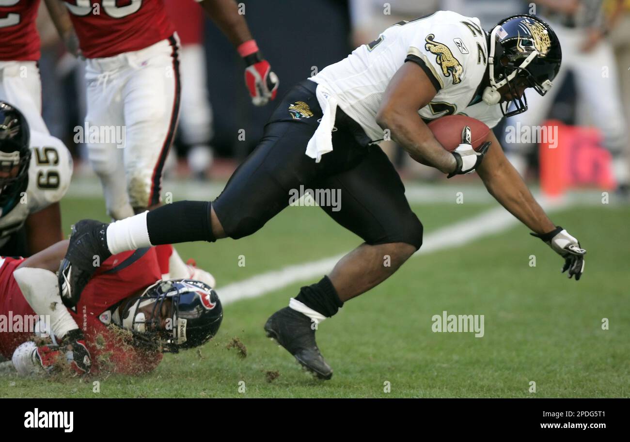 Jacksonville Jaguars' LaBrandon Toefield (22) breaks away from Houston ...