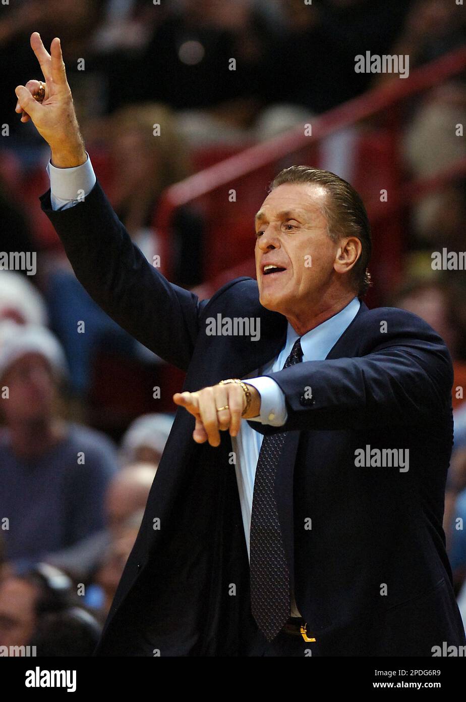Miami Heat coach Pat Riley gives instruction to his players during the ...