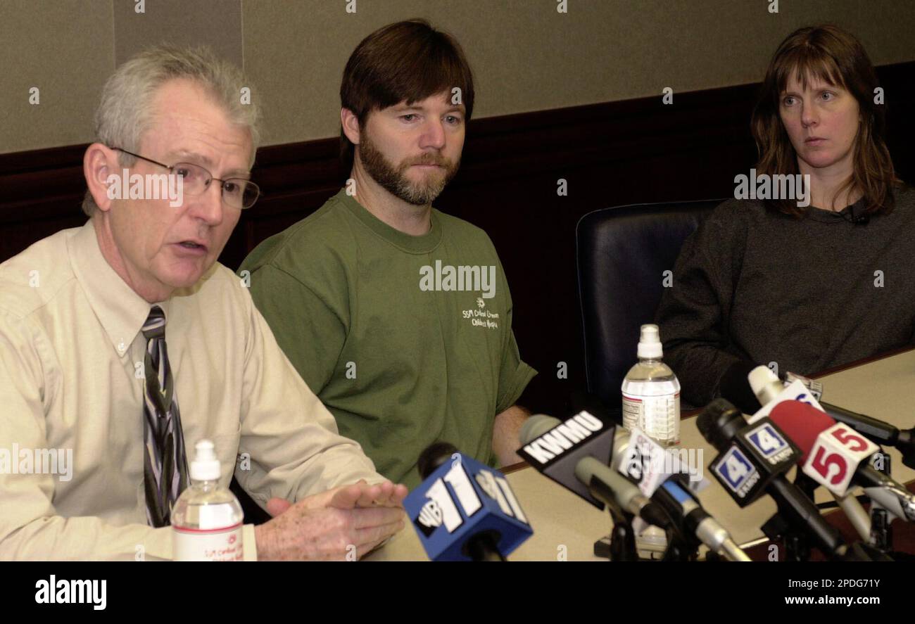 Dr. Dennis O'Connor, left, speaks during a news conference Friday, Dec ...