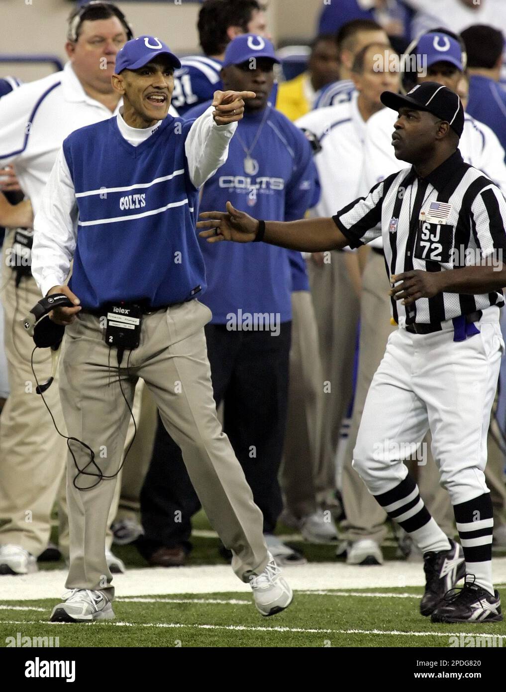 Indianapolis Colts head coach Tony Dungy, left, complains about a call ...