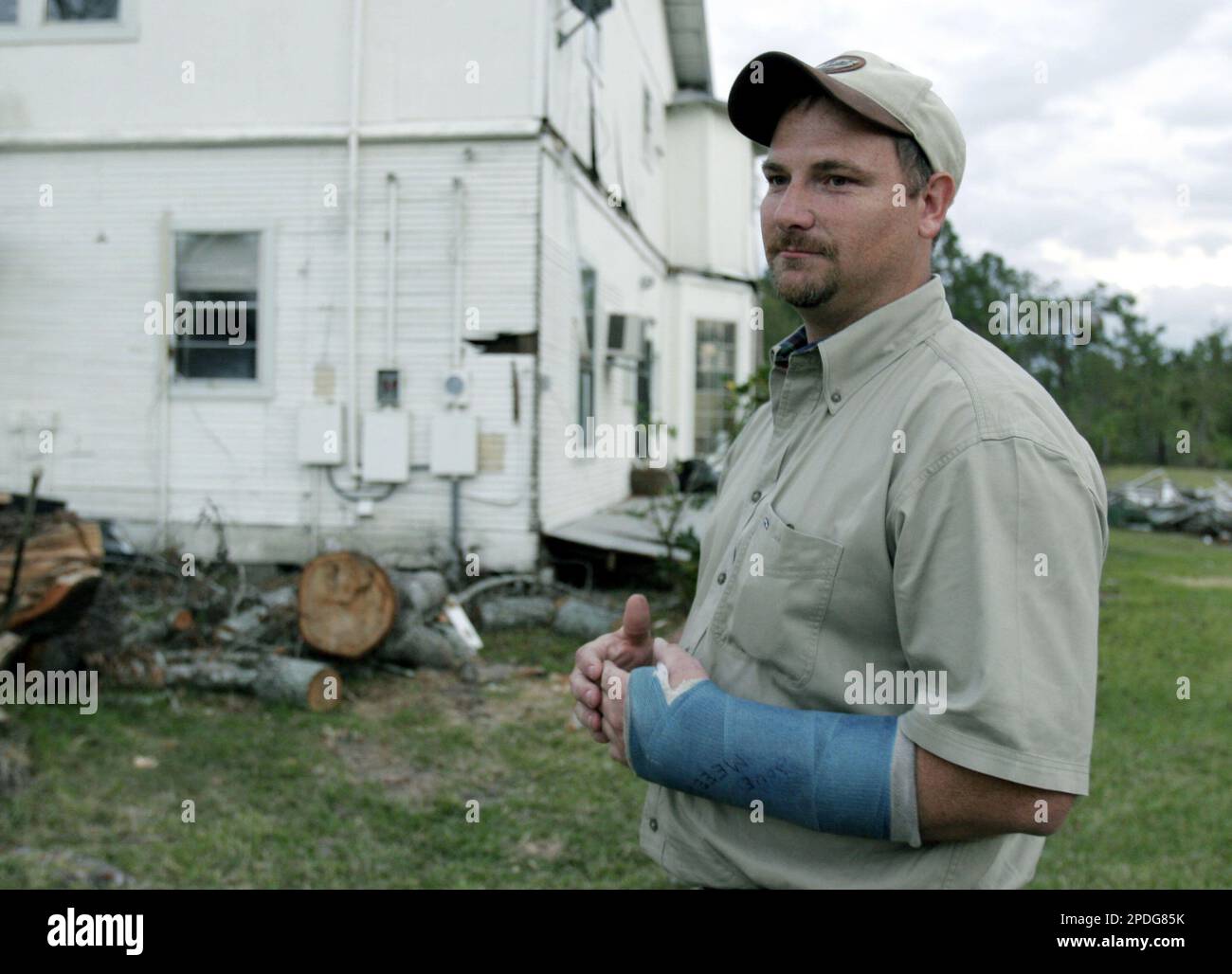 Kevin Poole stands outside his damaged home in Buna, Texas, Nov. 4 ...