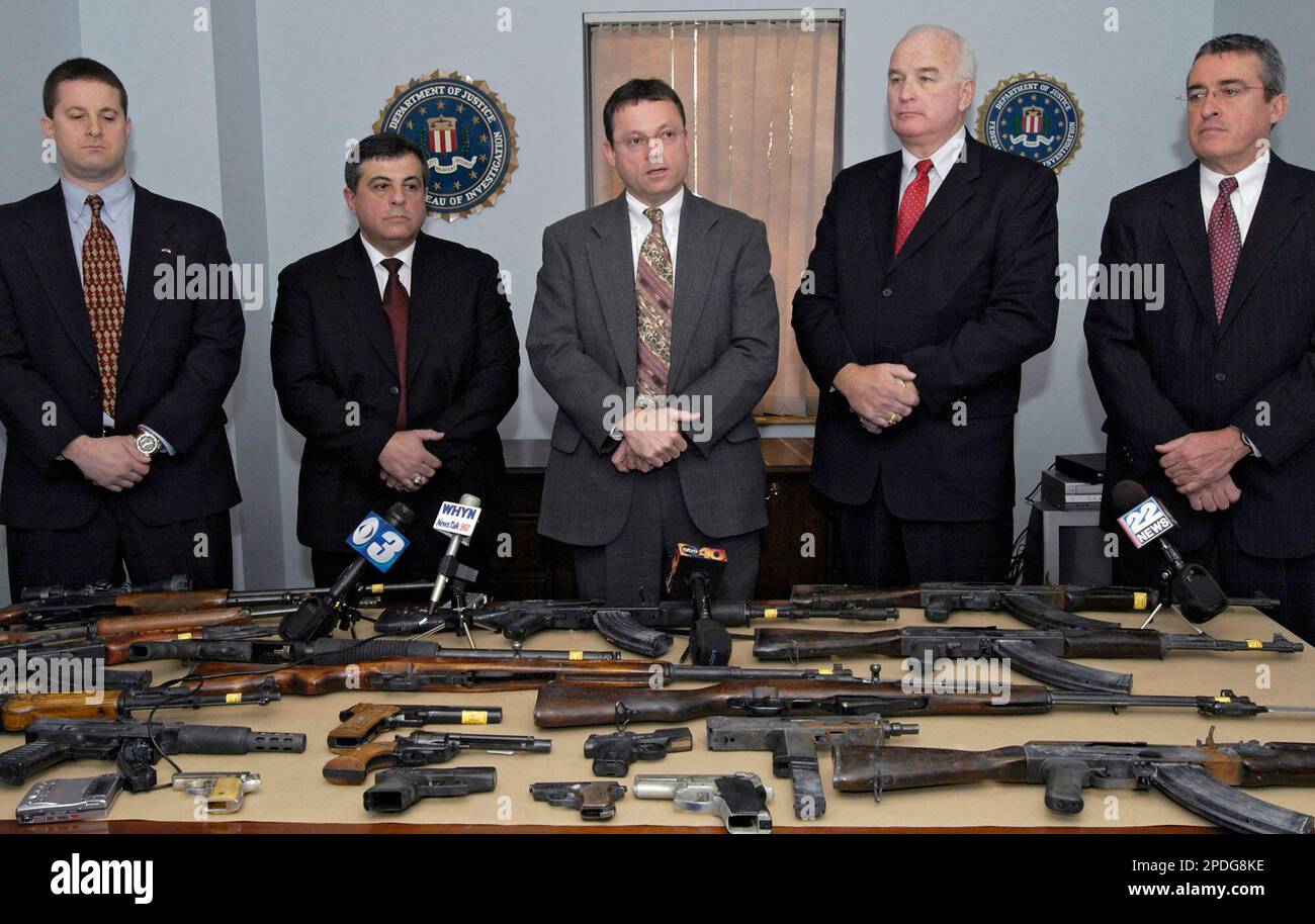 Michael G. O'Reilly, center, who heads the Springfield FBI office, is ...