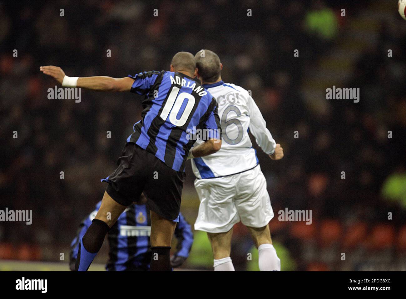 Inter of Milan forward Adriano of Brazil, left, clashes with Empoli ...