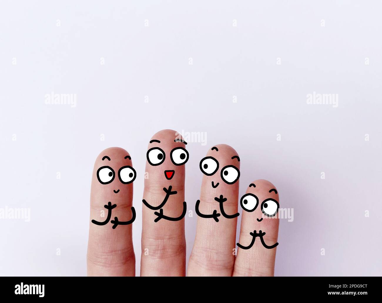 Four fingers are decorated as four person. They are happy Stock Photo ...