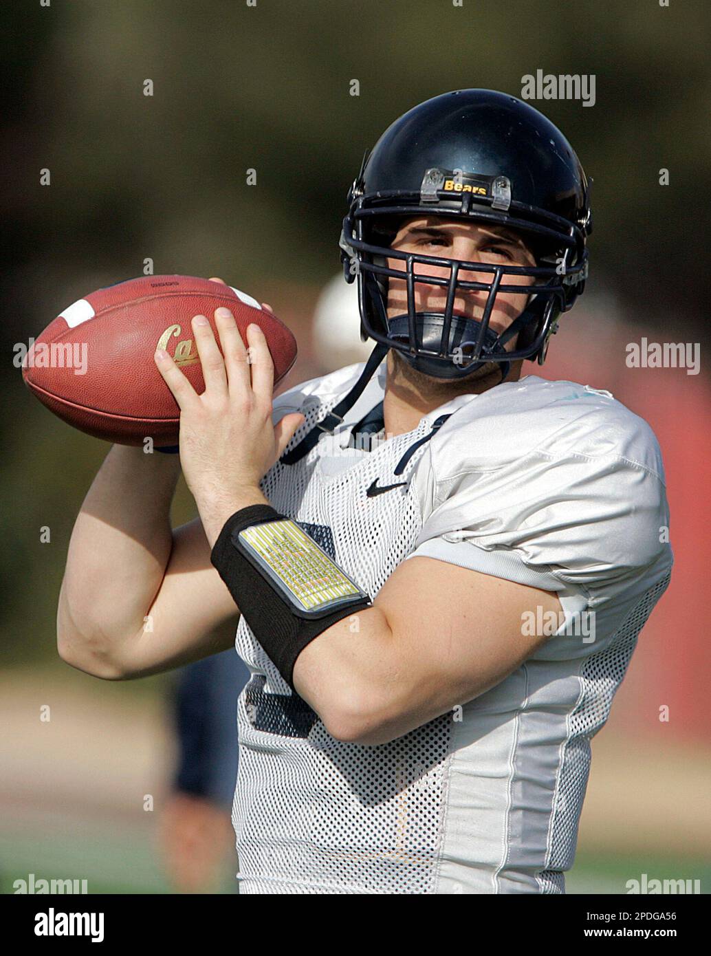 California quarterback Steve Levy looks to throw a pass during practice ...