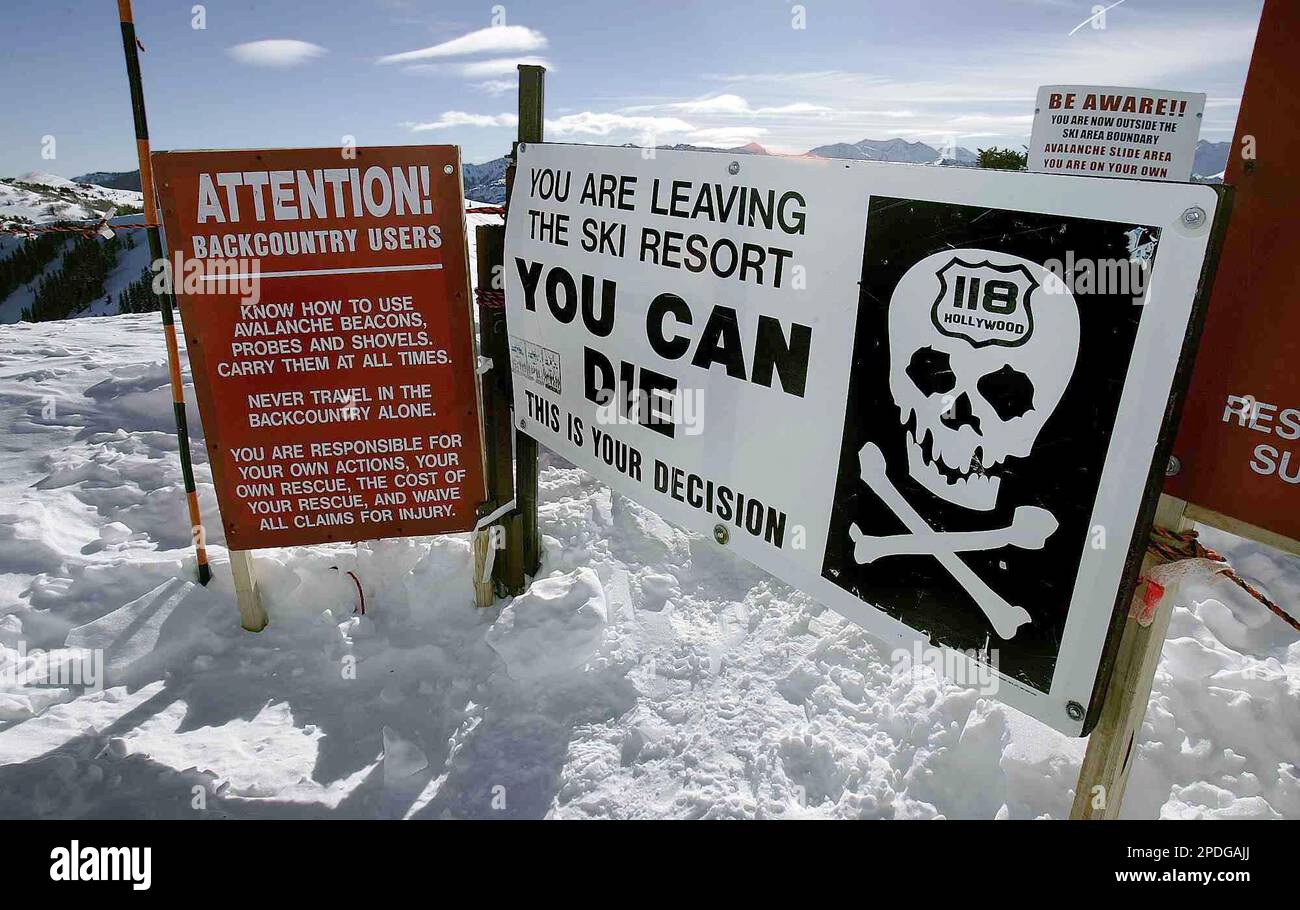 ** FILE ** Warning signs mark the boundary of The Canyons ski resort ...