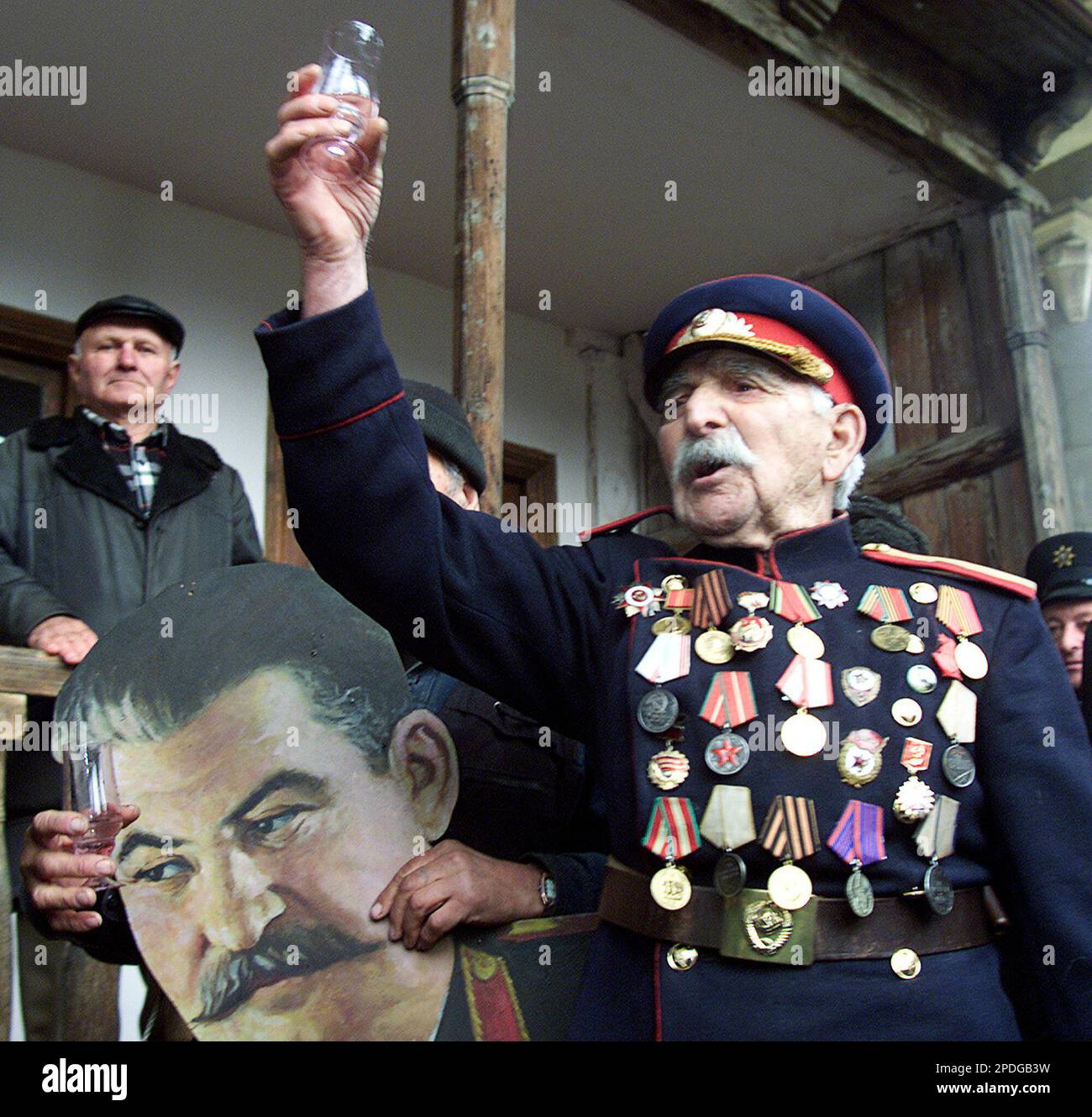 An elderly World War II veteran wearing 1950's-era Soviet police ...
