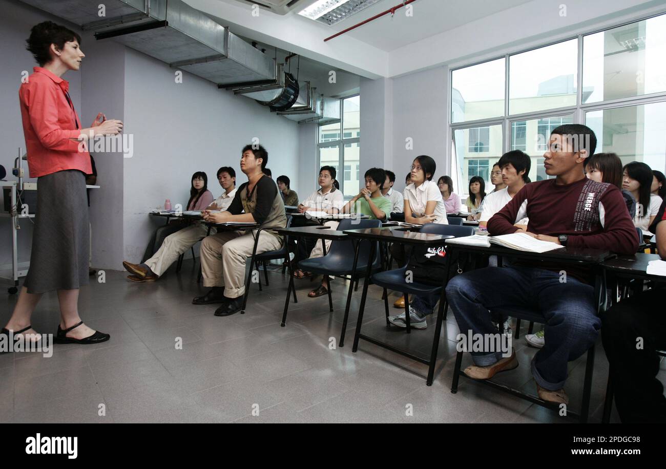 Indonesian tsunami survivor Rizal Shahputra, right, attends an English ...
