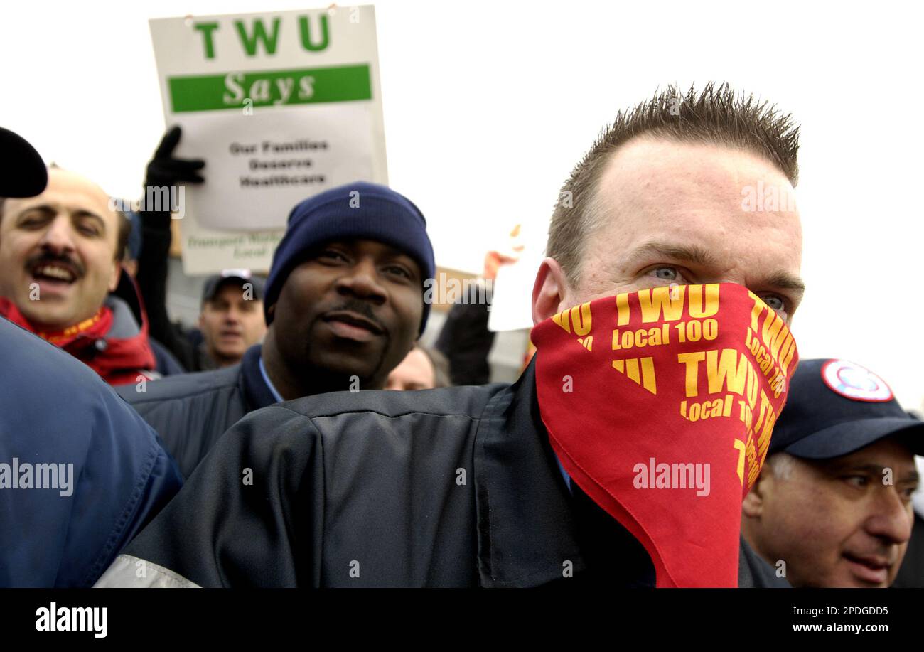 Bus driver Robert Imhoff, at right with bandana, stands with fellow ...