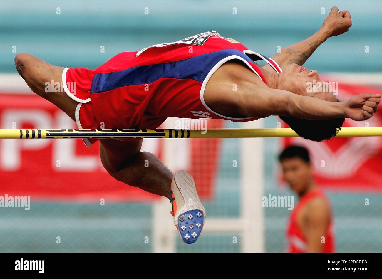Myanmar's Min Lwin clears the bar during the men's High Jump finals at ...