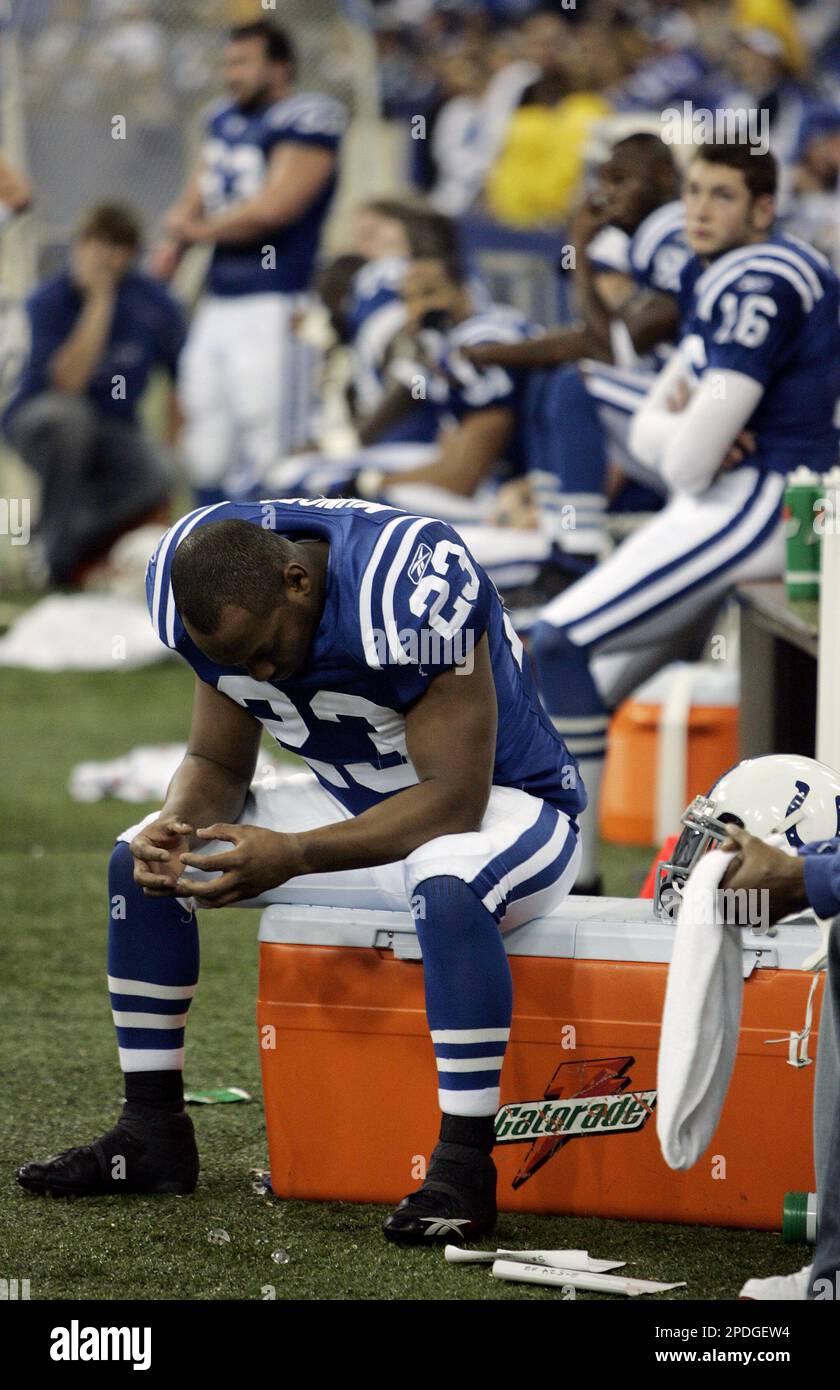 Indianapolis Colts running back James Mungro sits on the sidelines in ...