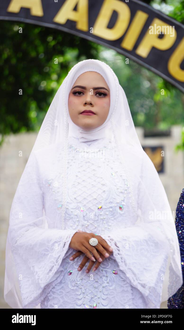 Indonesian with a Javanese wedding dress Stock Photo - Alamy