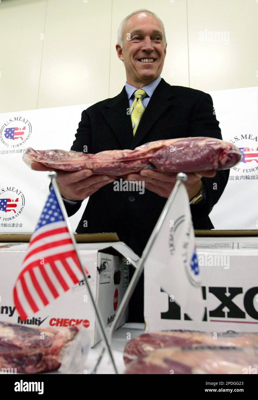 Philip Seng, president and CEO of U.S. Meat Export Federation, shows a ...