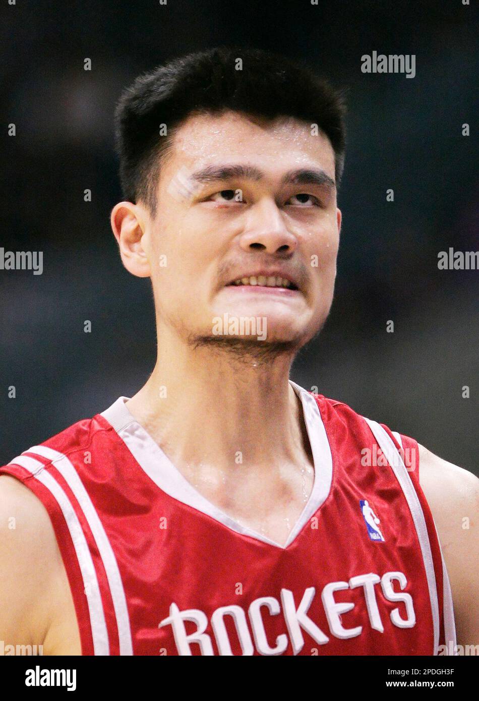 Houston Rockets' Yao Ming, of China, makes a face as he looks up toward ...