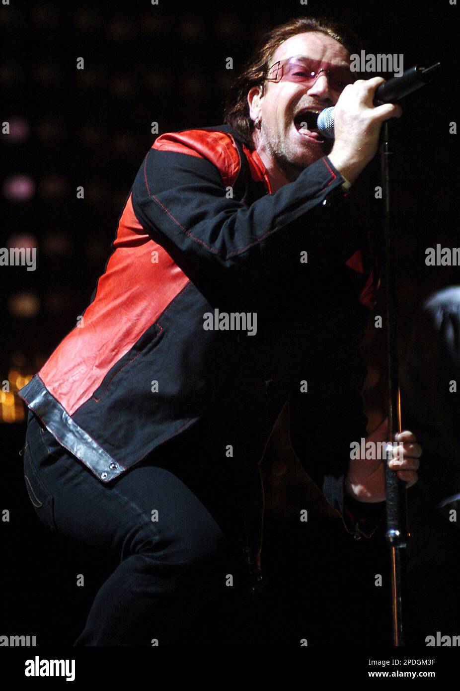 Bono sings during a U2 concert Thursday night, Dec. 15, 2005, in Omaha ...