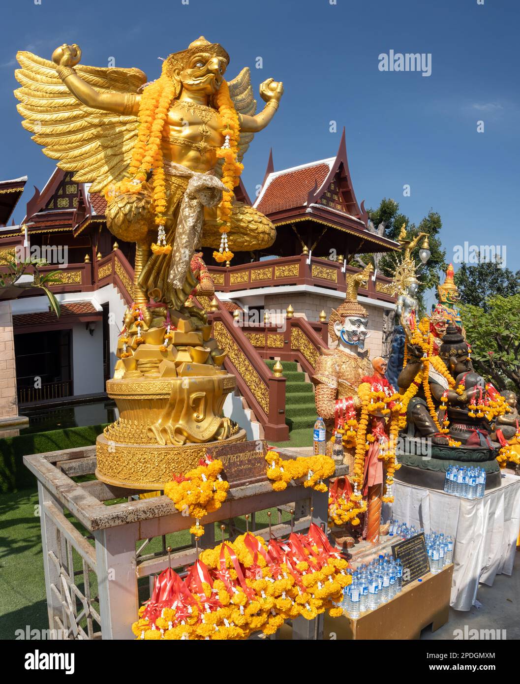 Religious statues with Garuda in the foreground at Buddhist temple Wat ...