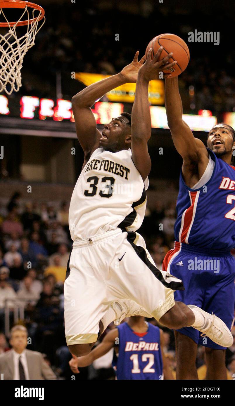 Wake Forest's Trent Strickland (33) has his shot blocked by Depaul's ...
