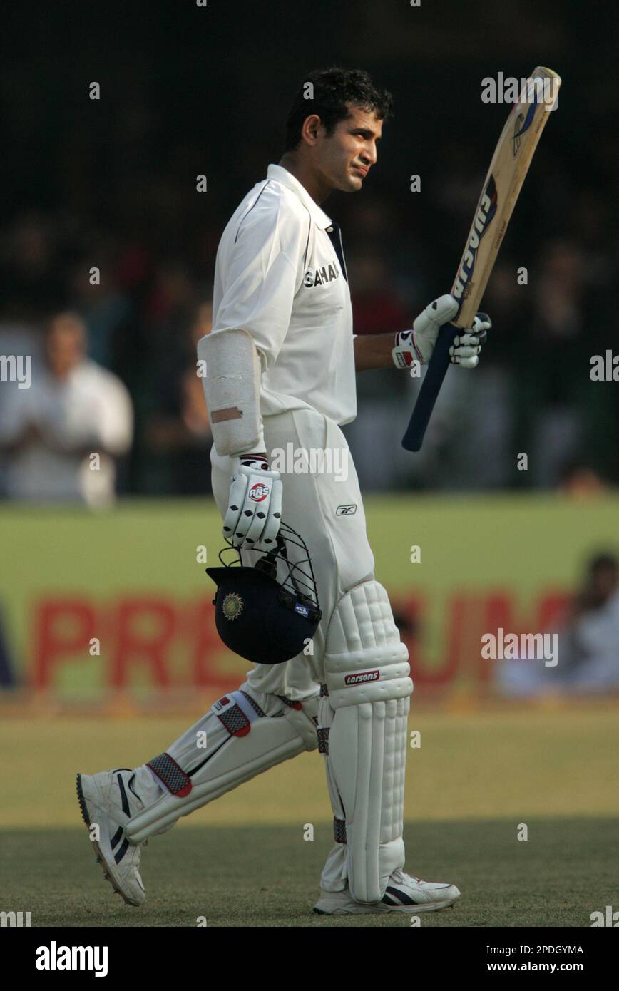Indian batsman Irfan Pathan walks back to the pavilion after his dismissal, on the third day of ...