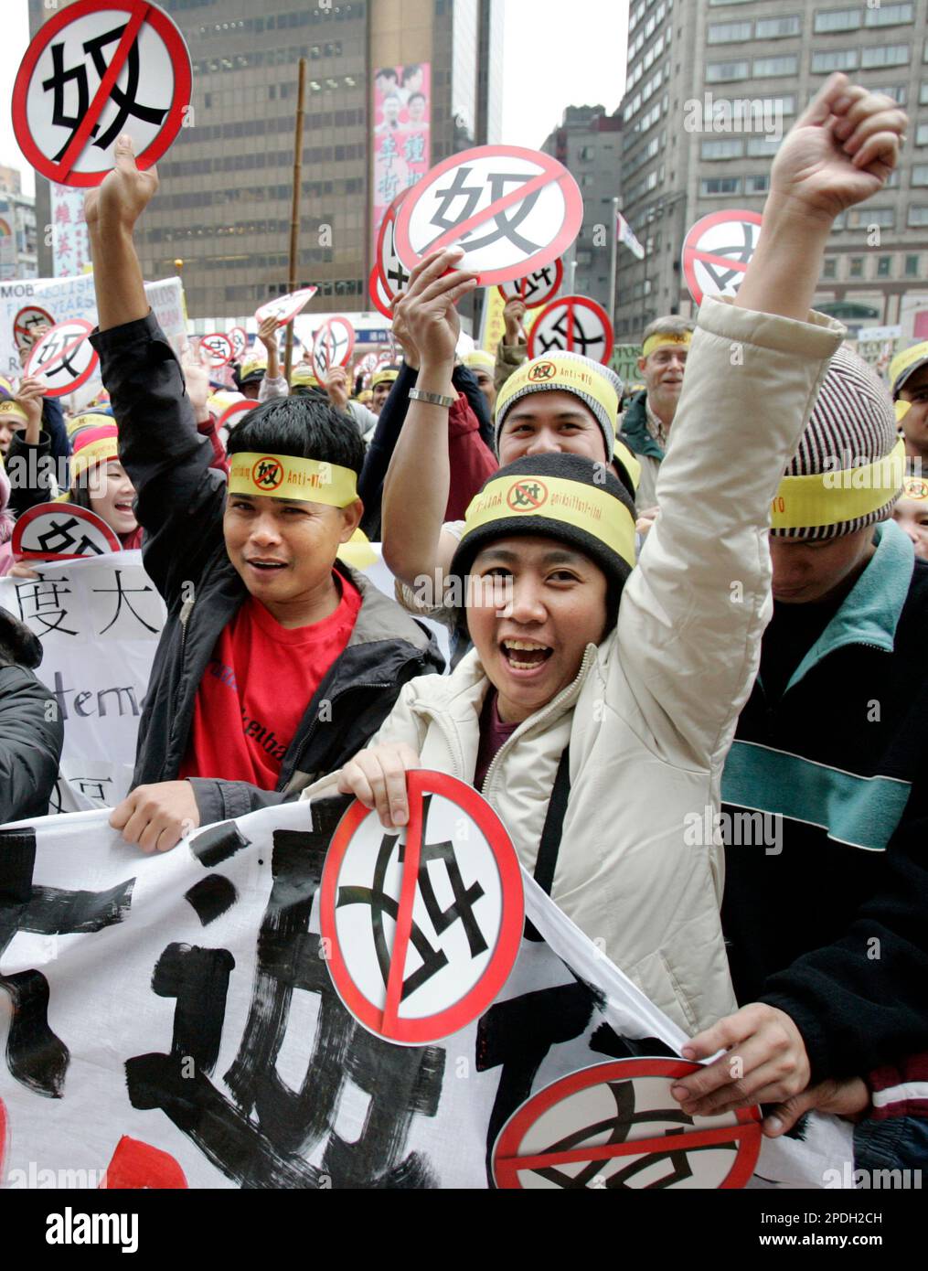 Holding Chinese signs reading "No to slavery," Philippine labor ...