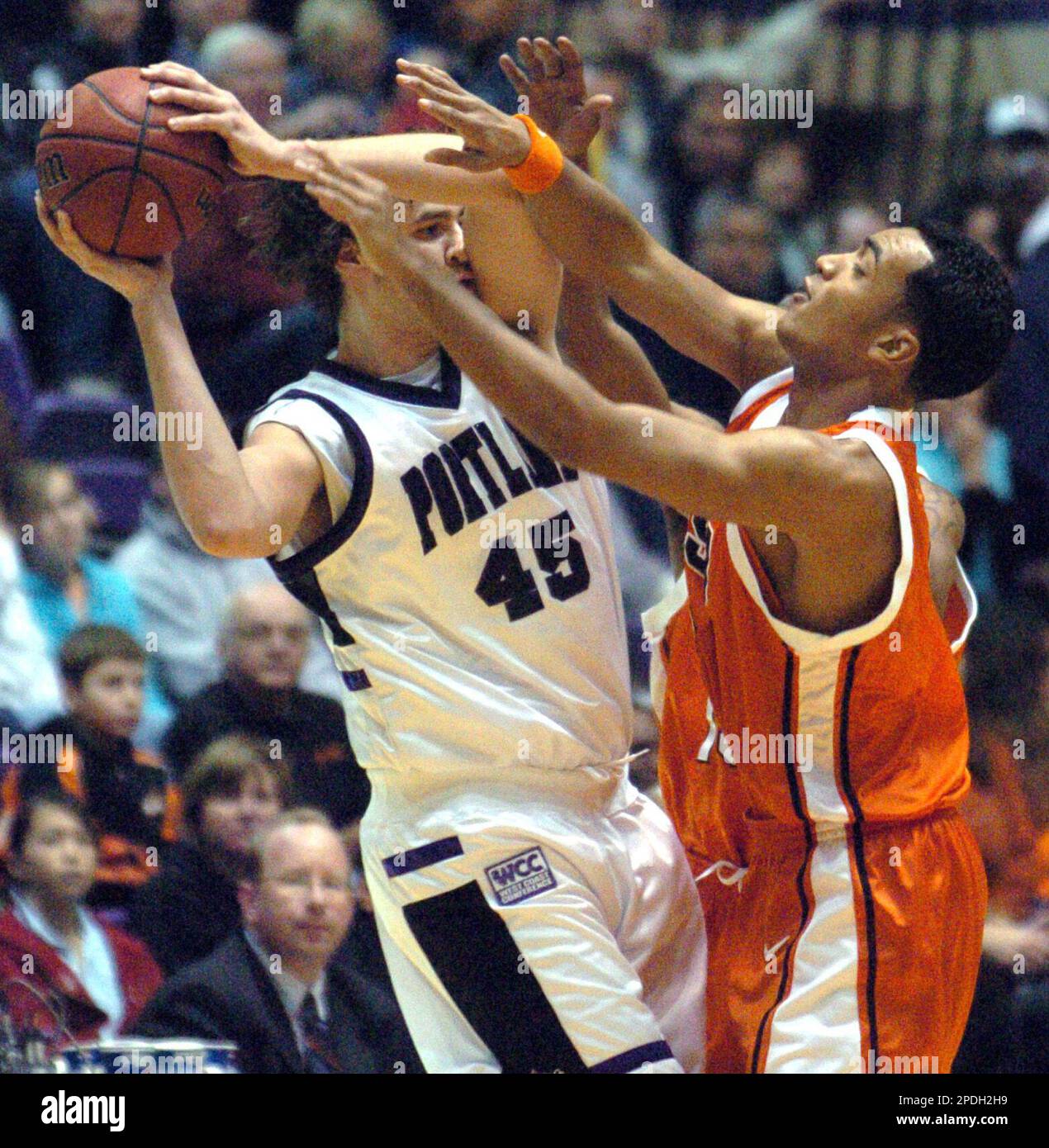 Oregon State's Marcel Jones, left, pressures Portlands' Ben Sullivan ...