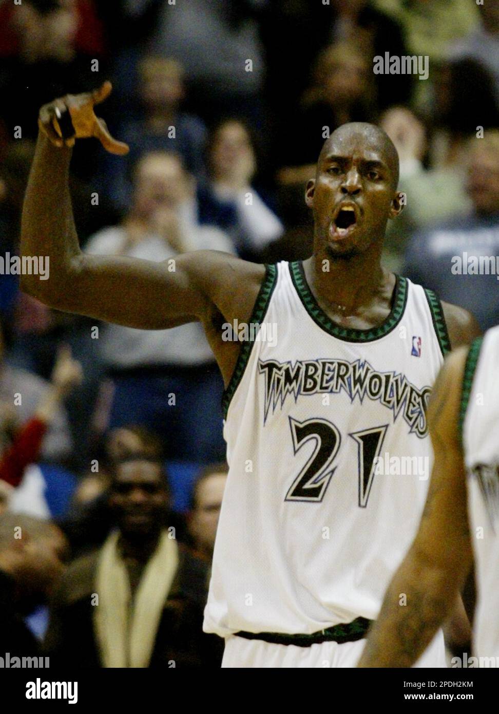 Minnesota Timberwolves forward Kevin Garnett celebrates late in the ...