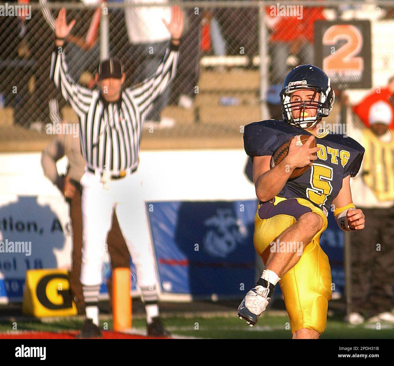 Highland Park's Jake Feldt goes in for one of his five touchdowns ...