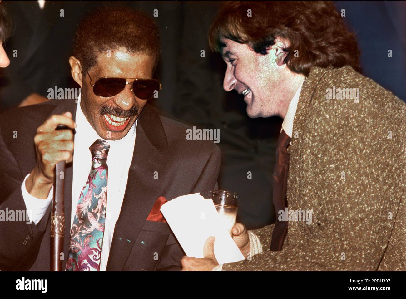 Comedians Richard Pryor, left, and Robin Williams share a laugh at the ...