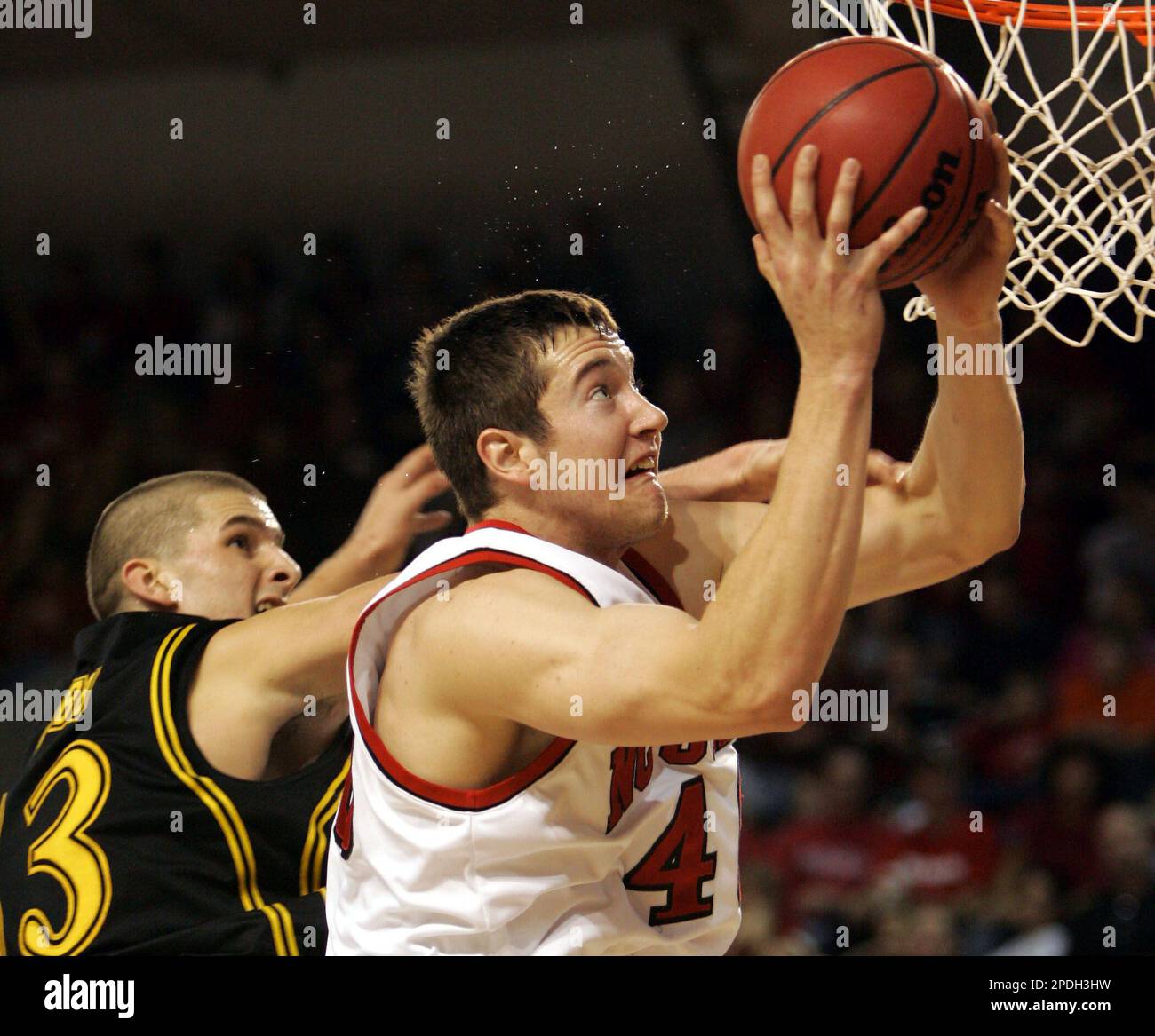 North Carolina State's Andrew Brackman, right, is fouled by Appalachian ...