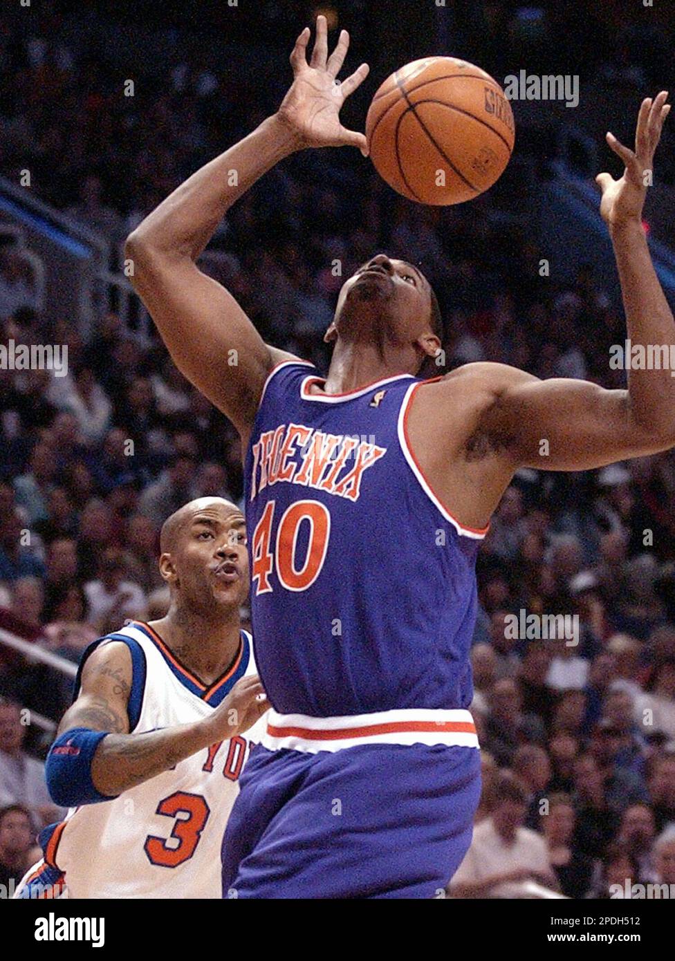 Phoenix Suns center Kurt Thomas (40) grabs a rebound against New York ...