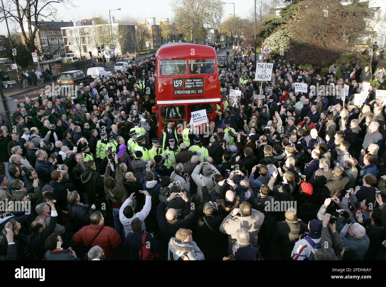 The last routemaster double-decker bus is surrounded by fans as it ...
