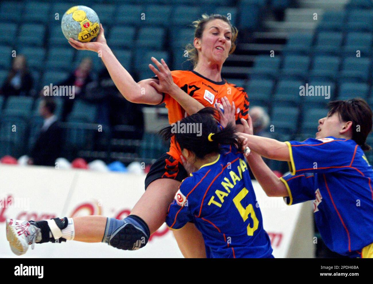 Netherland's Irina Pusic, left, attempts to score as Japan's Mineko ...