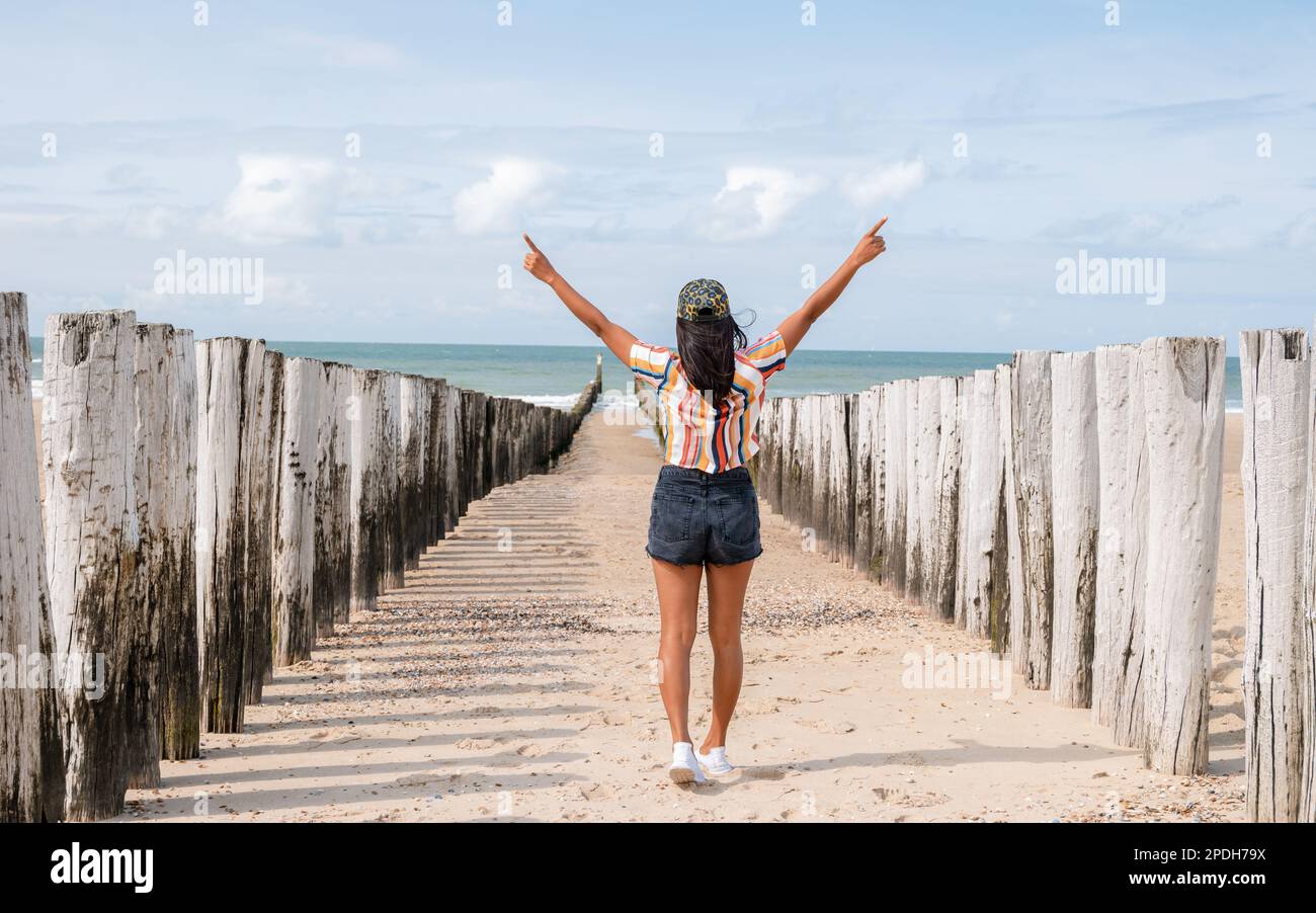 Beach poles on the beach of Domburg, Zeeland, the Netherlands during ...