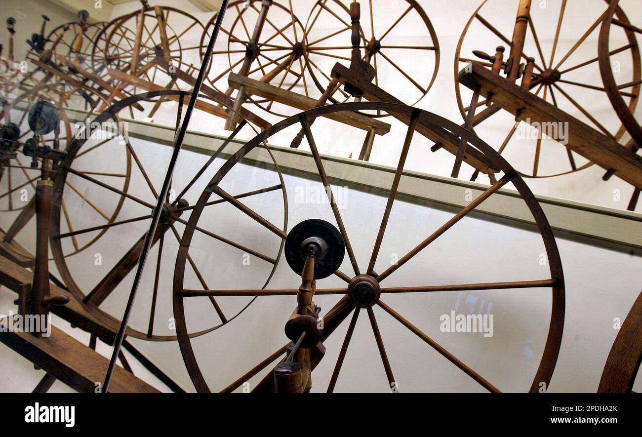 Spinning wheels are on display at the American Textile History Museum ...