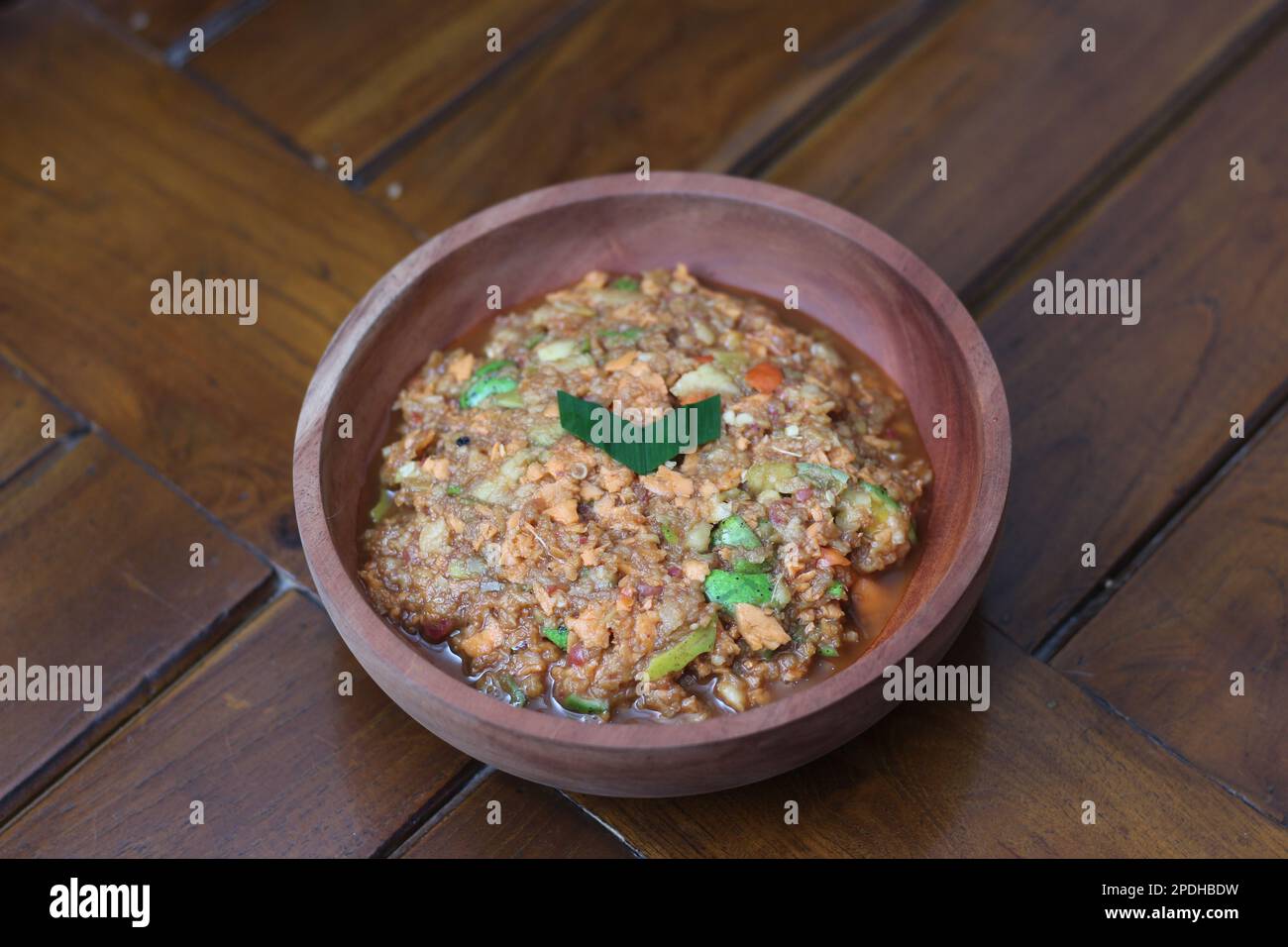 a close up Rujak Bebek or smashed fruit which is made from raw fruit ...