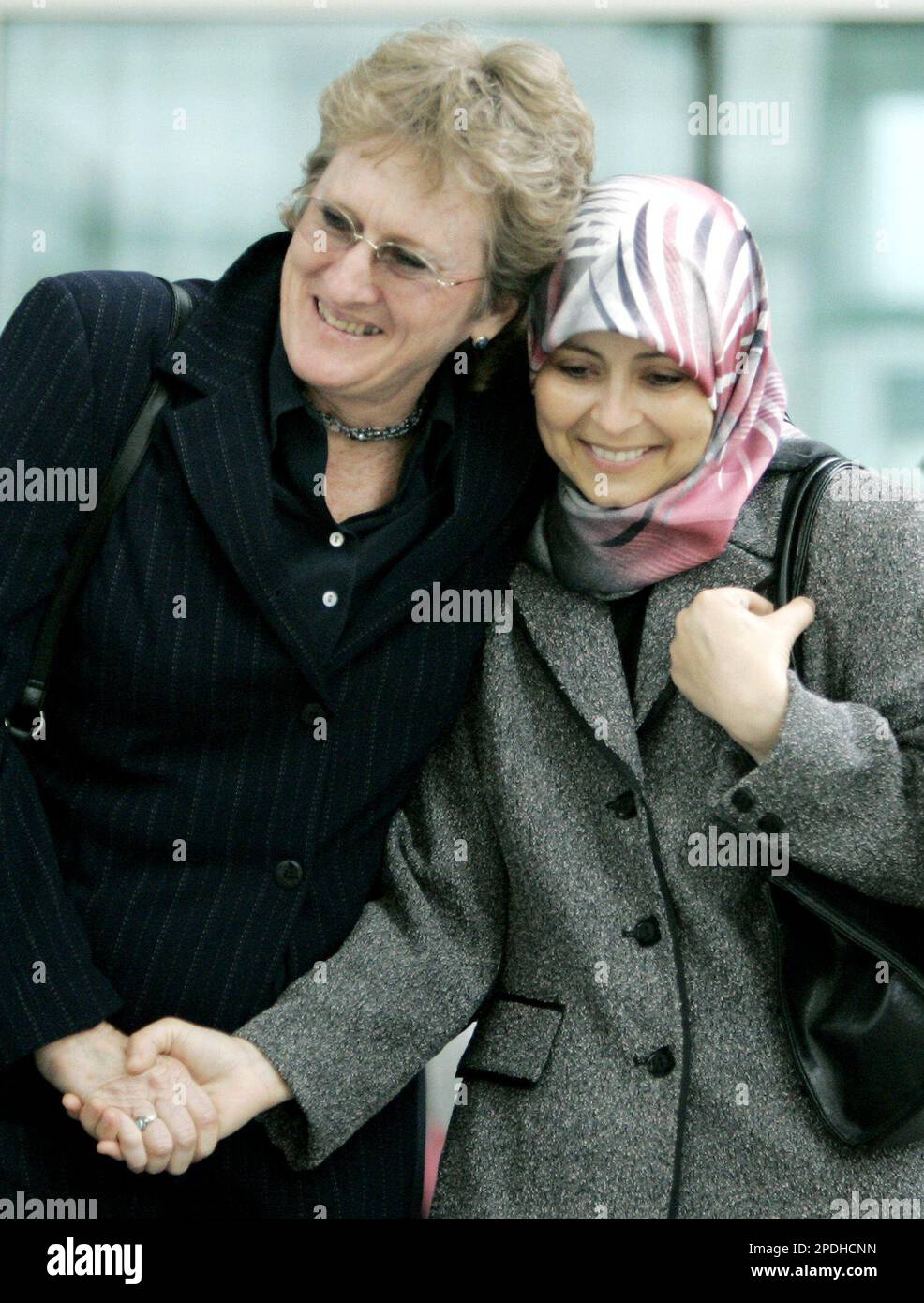 Nahla Al-Arian, right, wife of former University of South Florida professor Sami Al-Arian, hugs ...