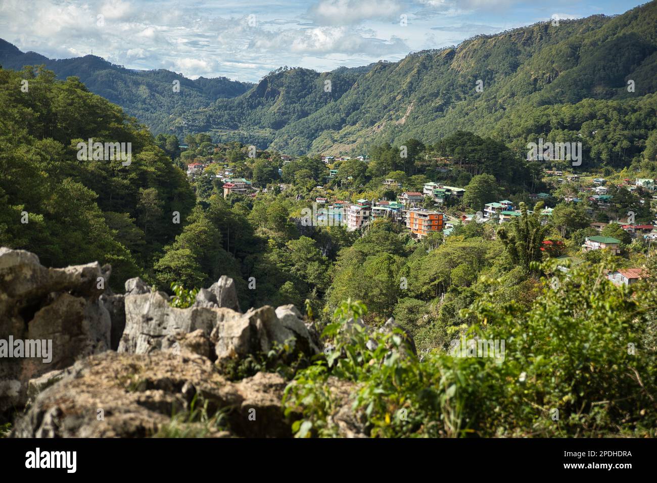 The imposing valley with houses in Sagada, Philippines, enclosed by ...
