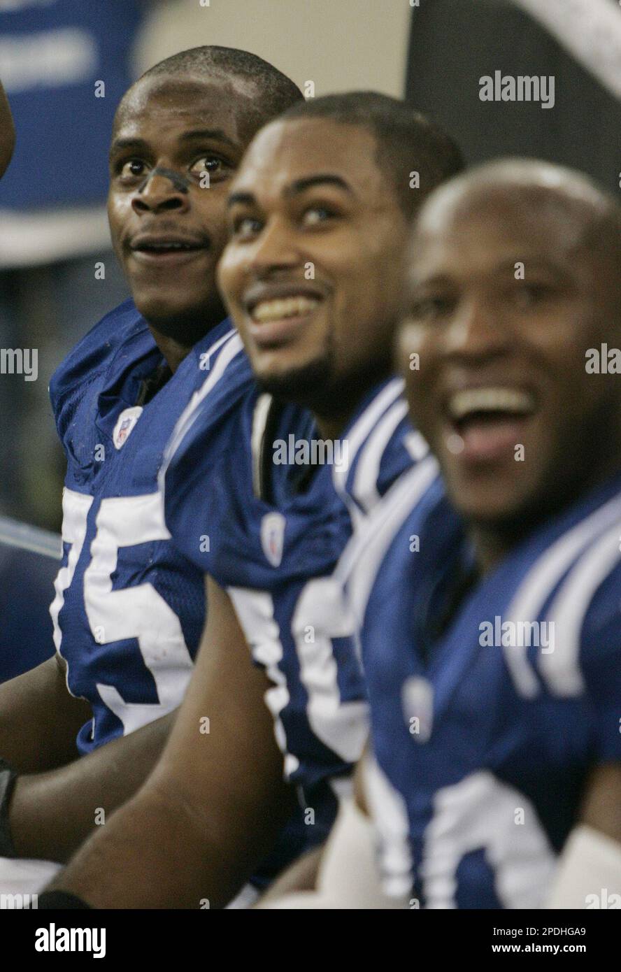 Indianapolis Colts Larry Tripplett, left, watches his 60-yard fumble ...